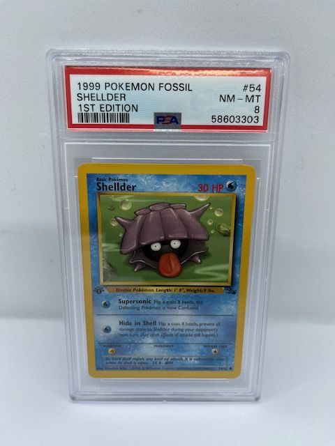 Shellder 54/62 PSA 8 Graded Common Pokemon Card (1999 Pokemon Fossil) — Titan Cards Ltd